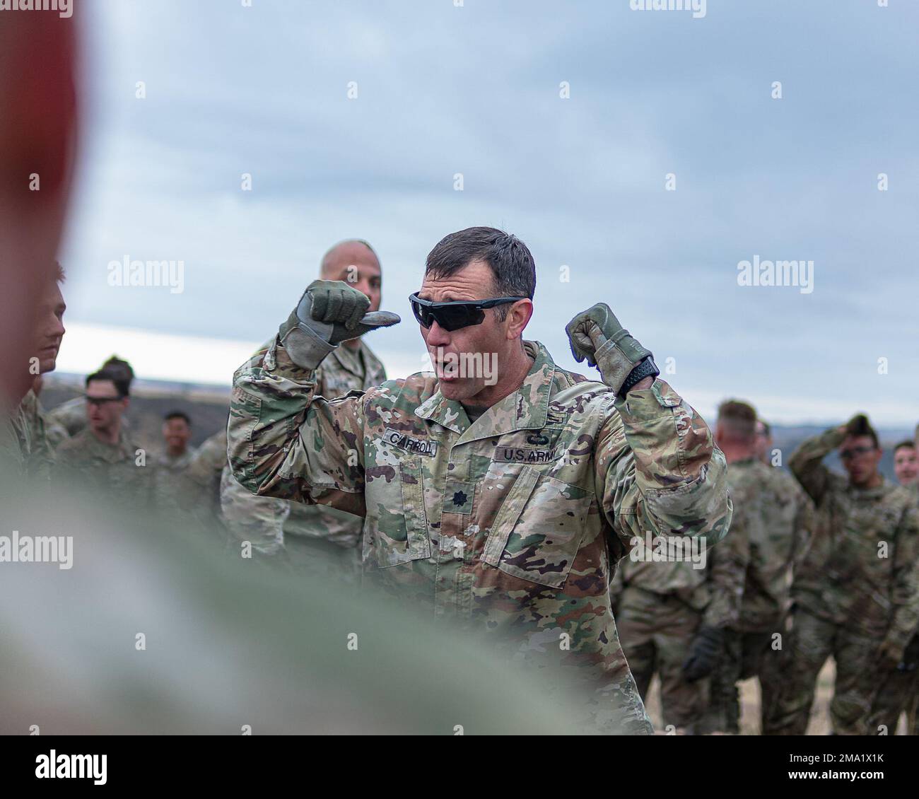 A Soldier assigned to 4th Infantry Division directs people to go down ...