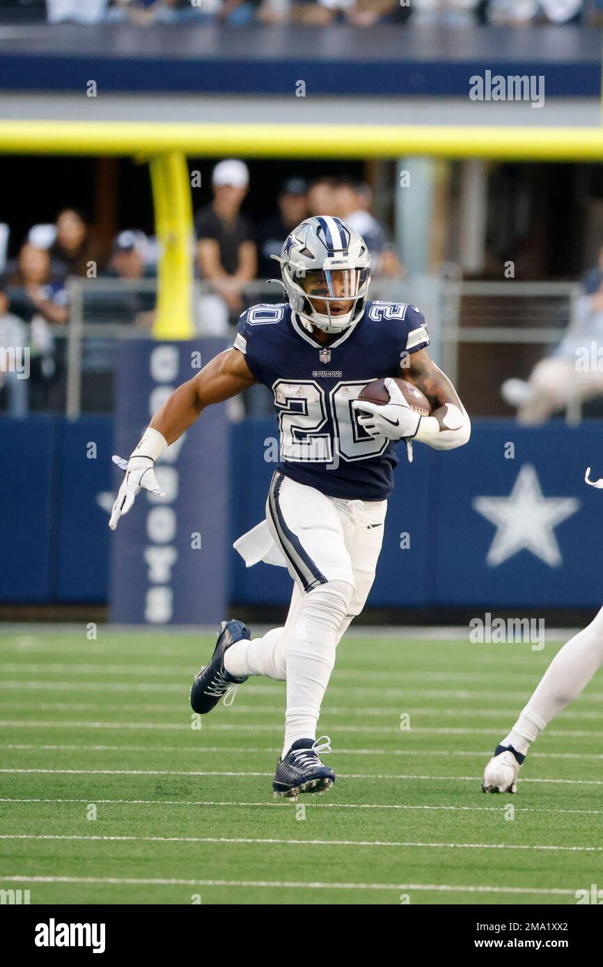 Dallas Cowboys running back Tony Pollard (20) runs against the Chicago ...