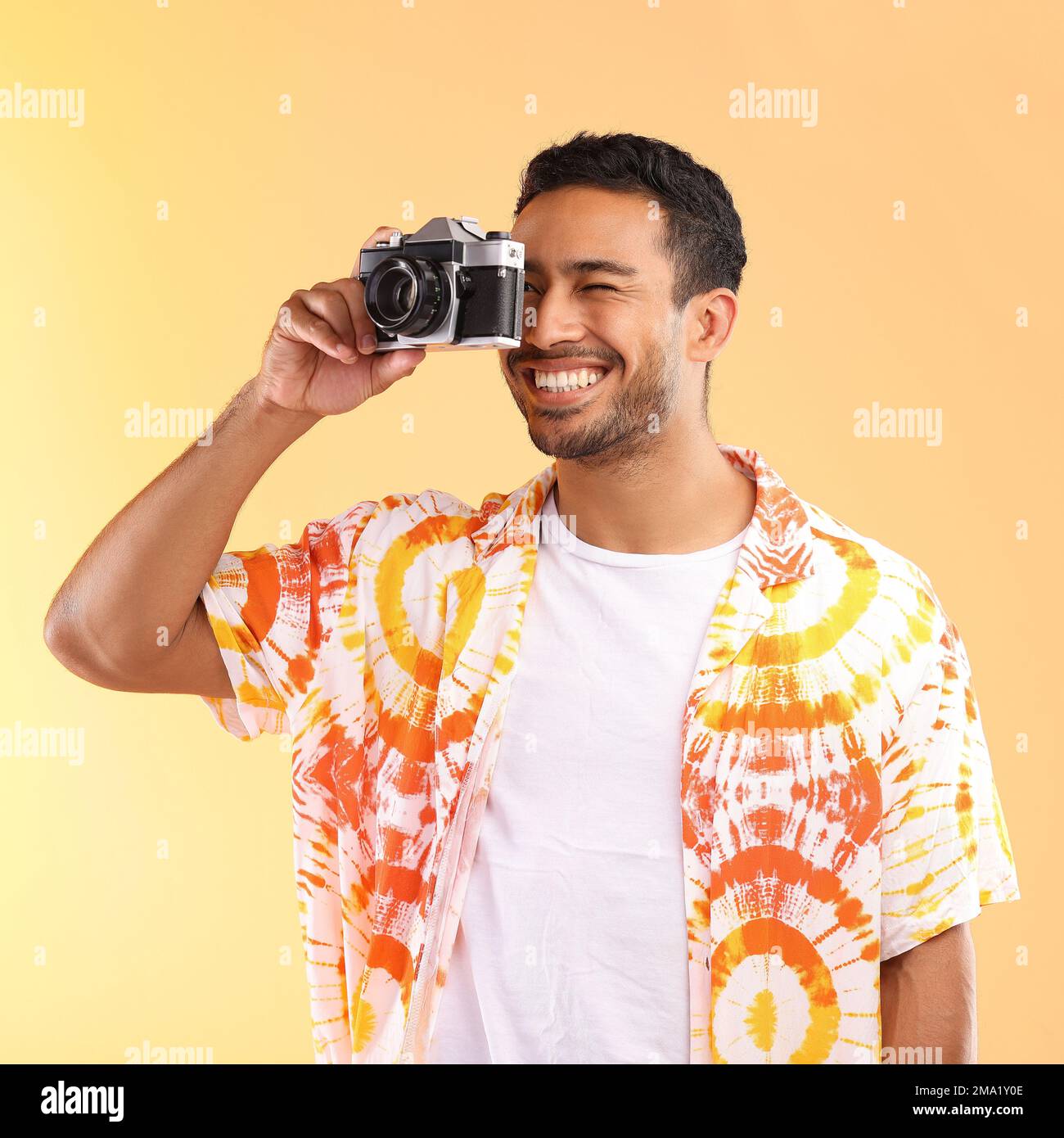Photographer, camera and man taking pictures in studio isolated on an ...