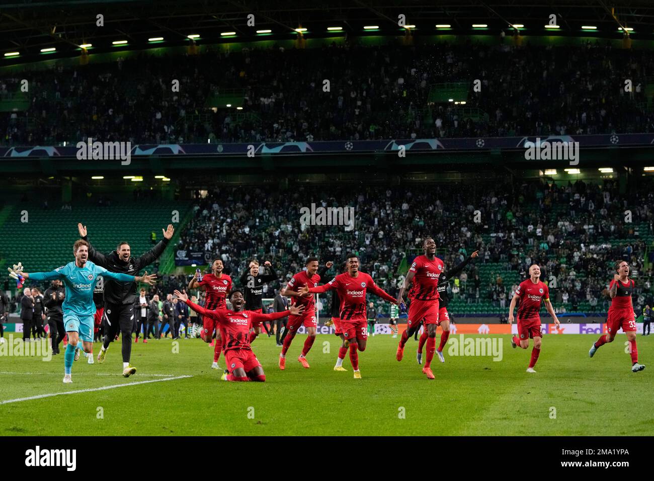 Frankfurt players celebrate after beating Sporting to quality for the ...
