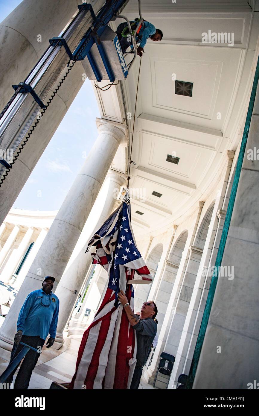 ANC Facilities Maintenance employees hang U.S. flags in the Memorial ...