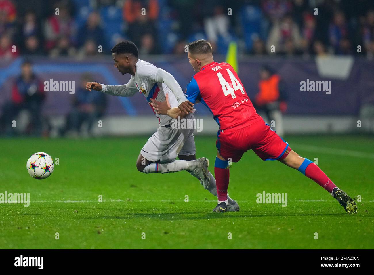 Barcelona's Ansu Fati, left, is challenged by Plzen's Libor Holik ...