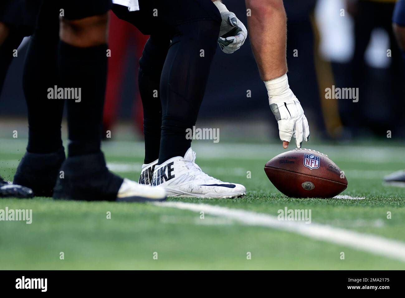 A football is seen during an NFL football game between the New England ...