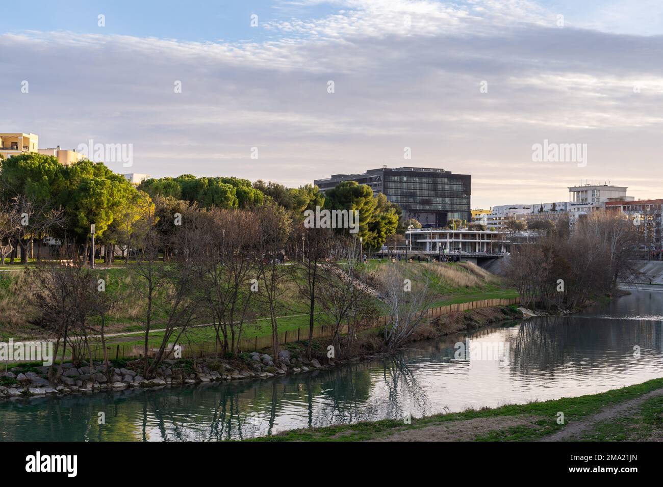 Landscape view on the Lez river with City Hall in background ...
