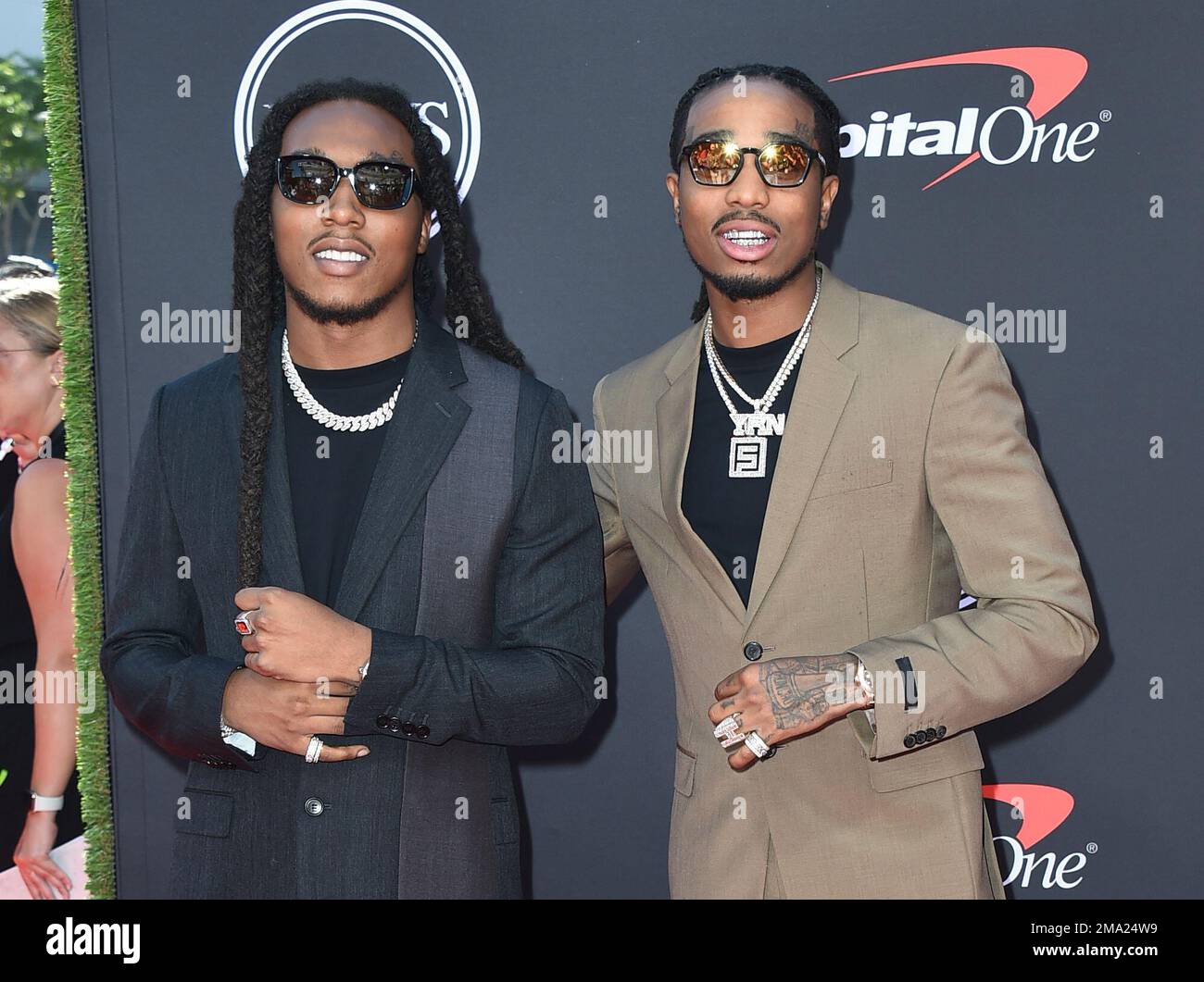 FILE - Takeoff, left, and Quavo, of Migos, arrive at the ESPY Awards in ...