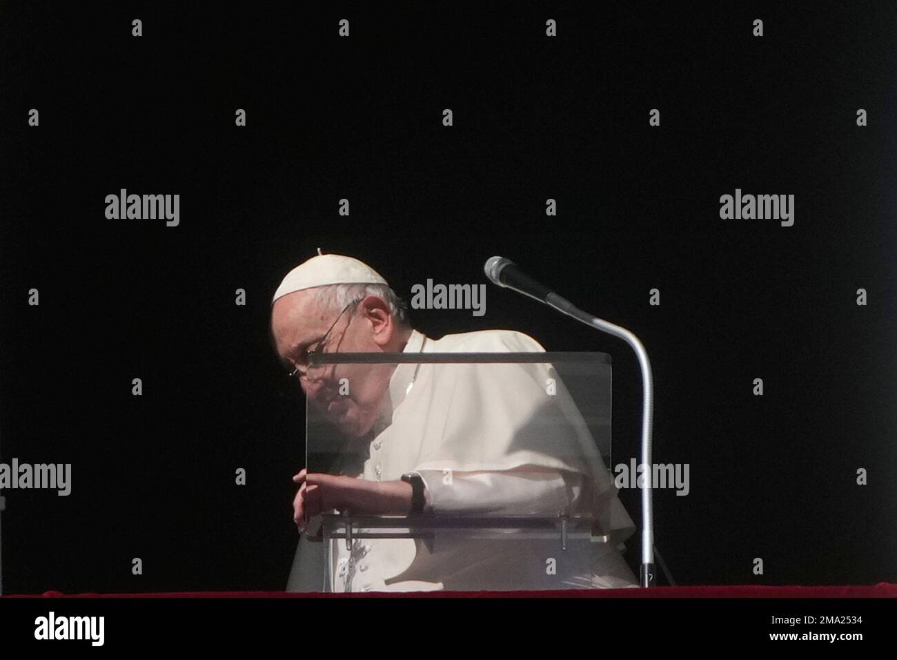 Pope Francis leaves after delivering the Angelus prayer from his studio ...