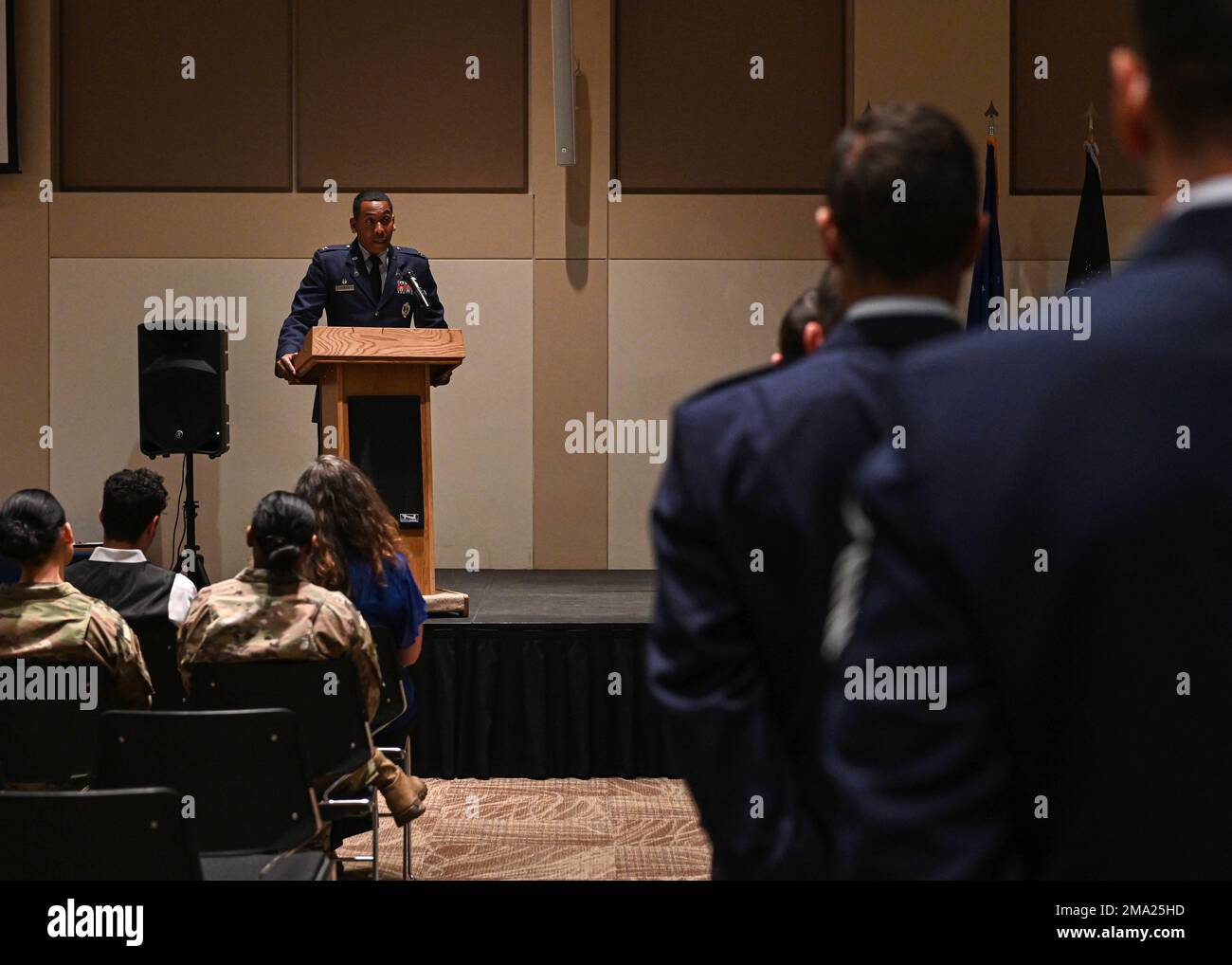 Col. Marcus Jackson, Space Base Delta 2 commander, speaks to the crowd ...