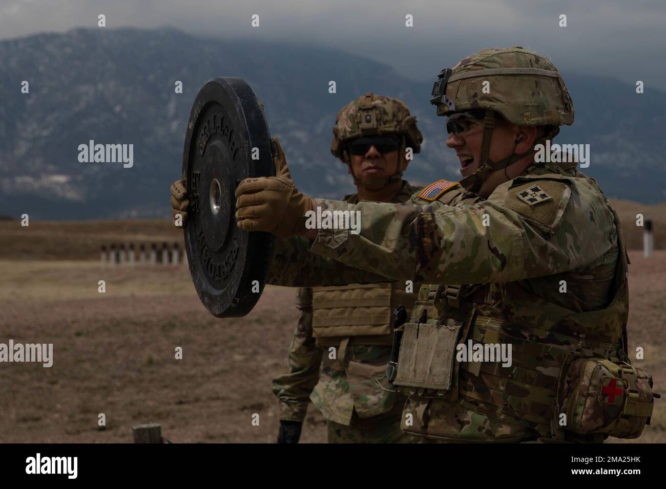 4th Infantry Division Soldiers compete in a pistol competition during ...