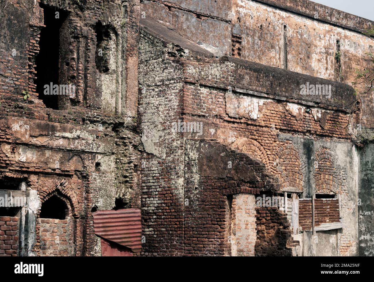 Fully damaged brick structural old abandoned building Stock Photo - Alamy