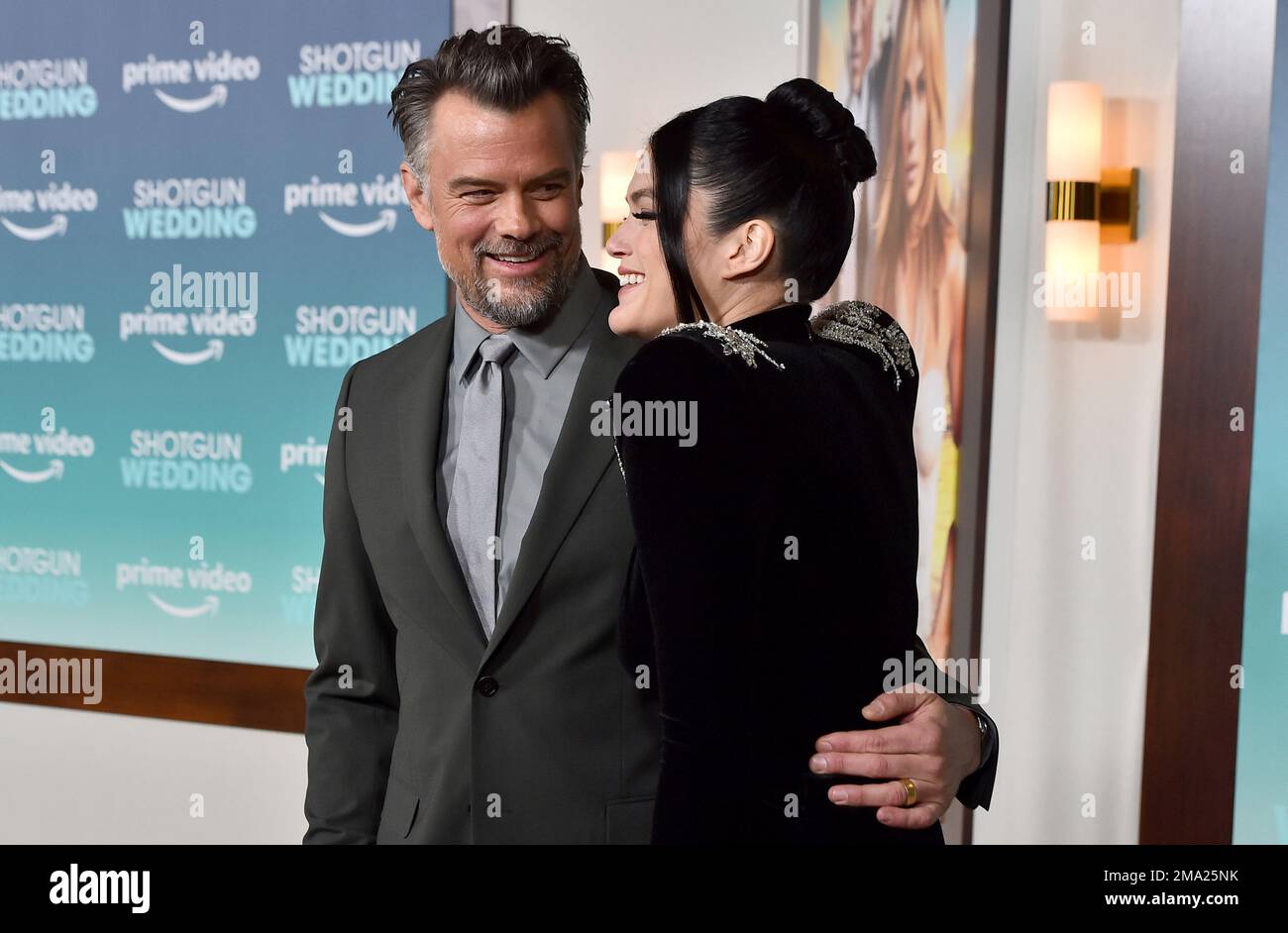 Josh Duhamel, left, and Audra Mari arrive at the premiere of "Shotgun ...