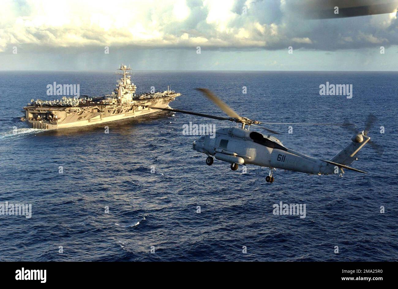 040706-N-5923E-098. [Complete] Scene Caption: A US Navy (USN) SH-60F ...