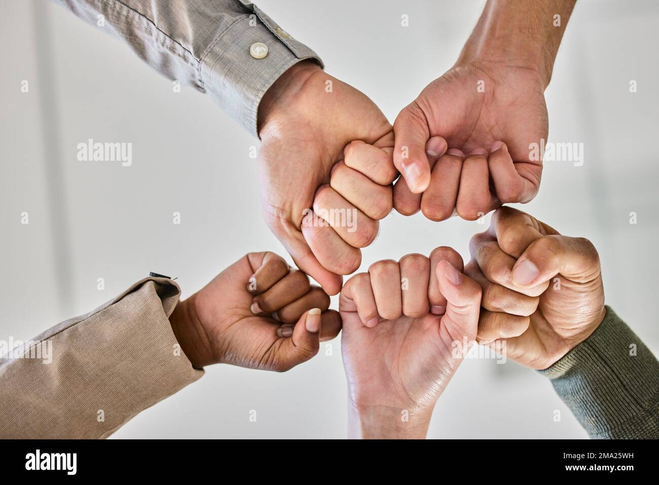 Theres still time. Below shot of a group of unrecognizable ...