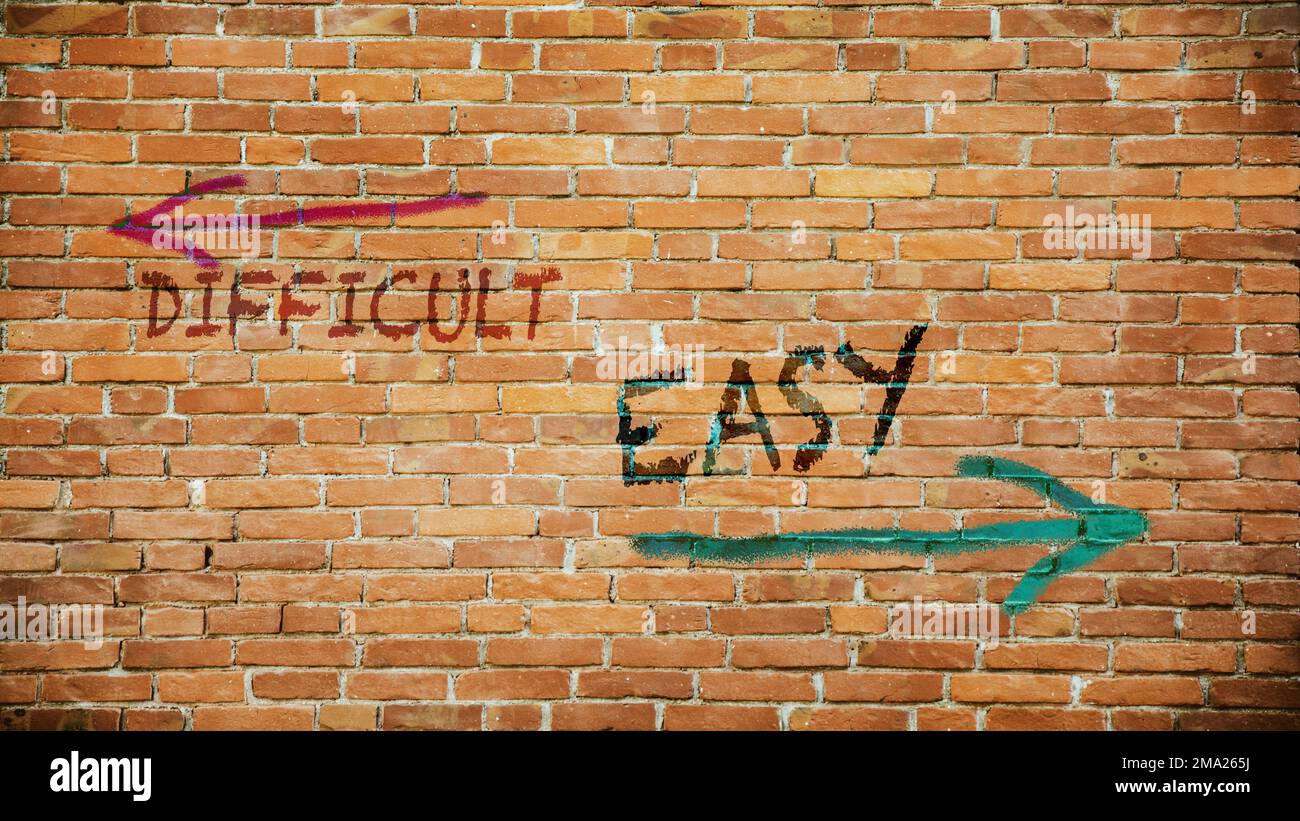 Street Sign the Direction Way to Easy versus Difficult Stock Photo - Alamy