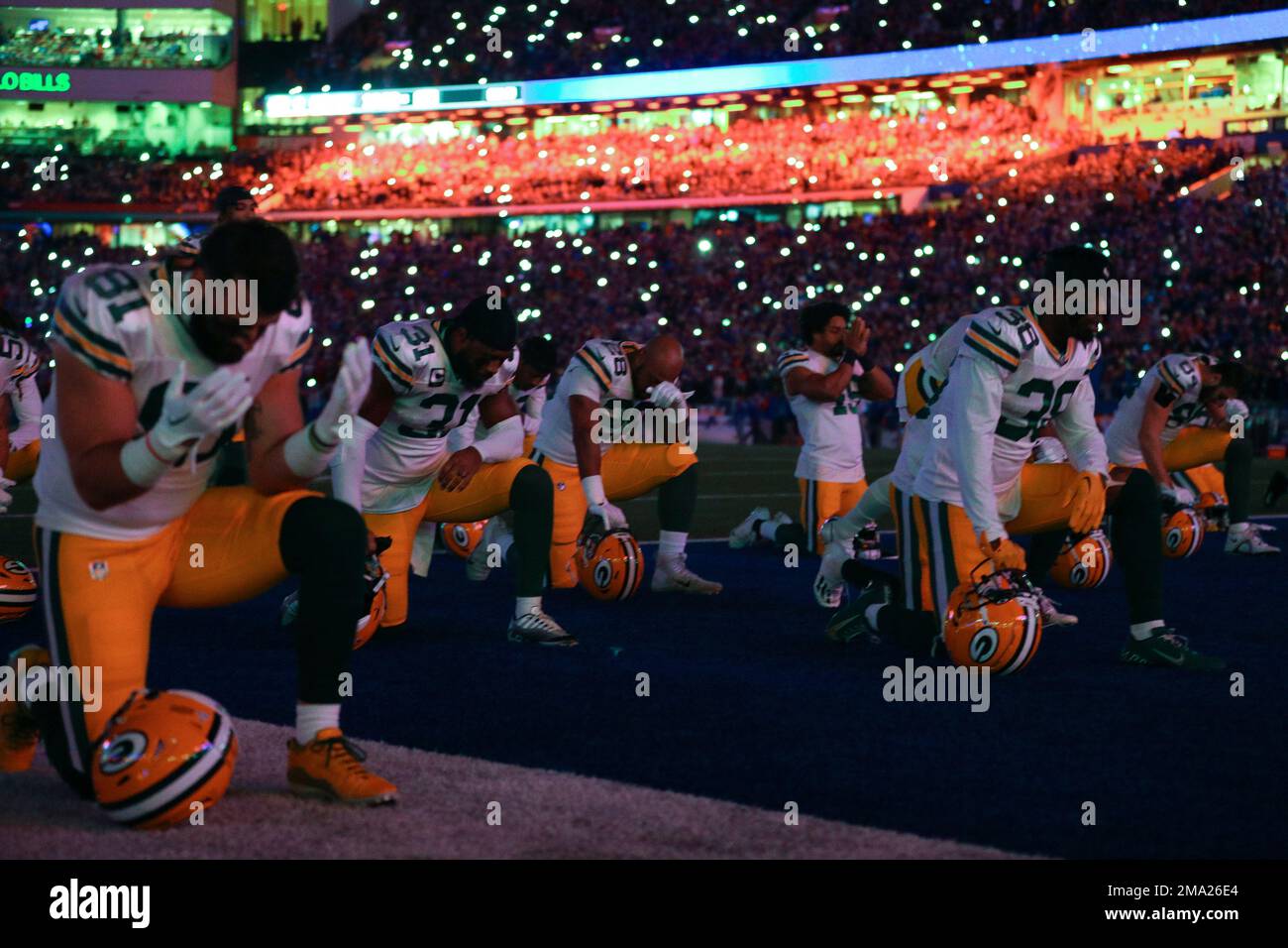 Green Bay Packers pray prior to an NFL football game against the ...