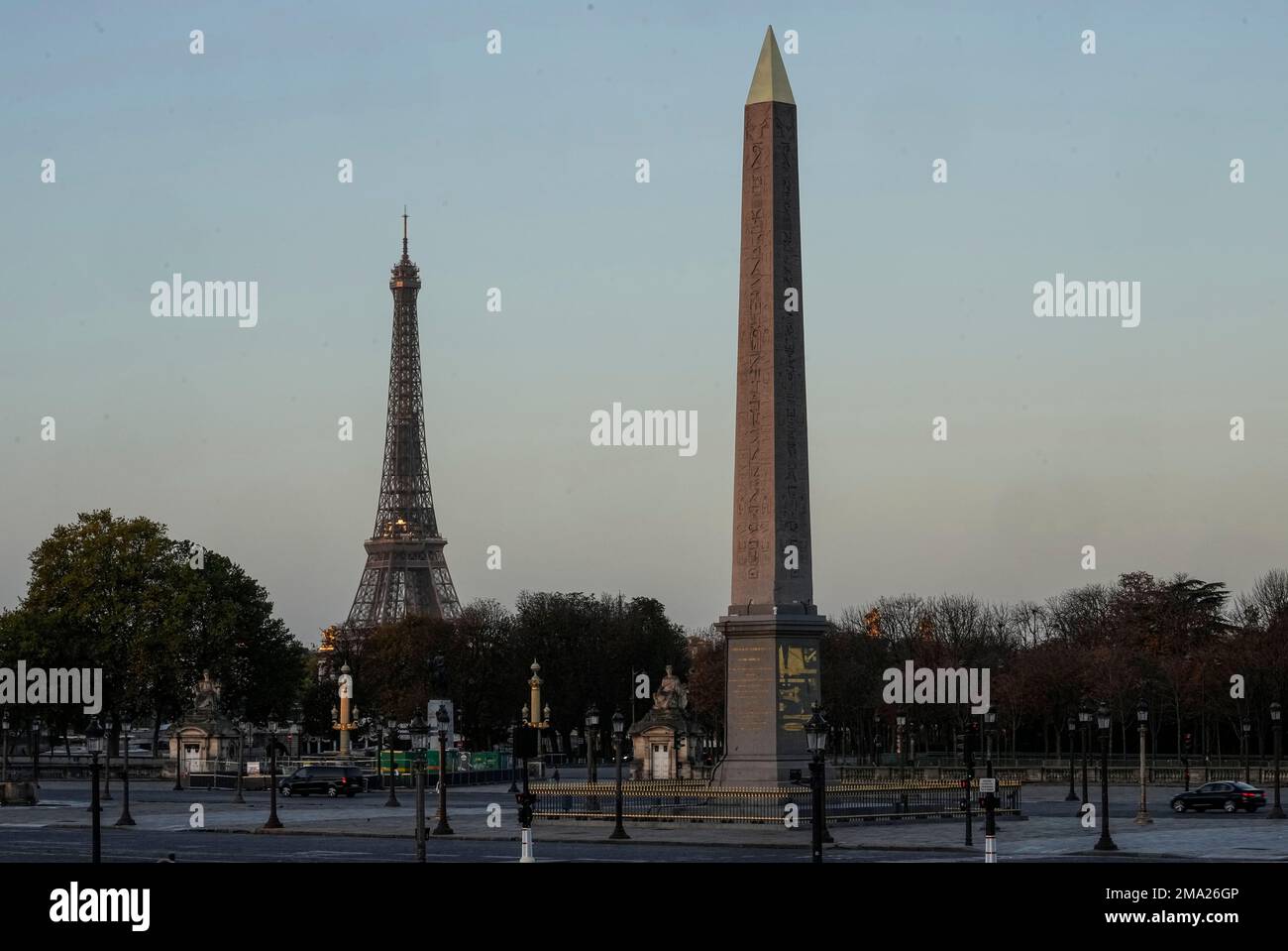 Paris skyline is seen behind the Eiffel Tower and the Obelisk at ...