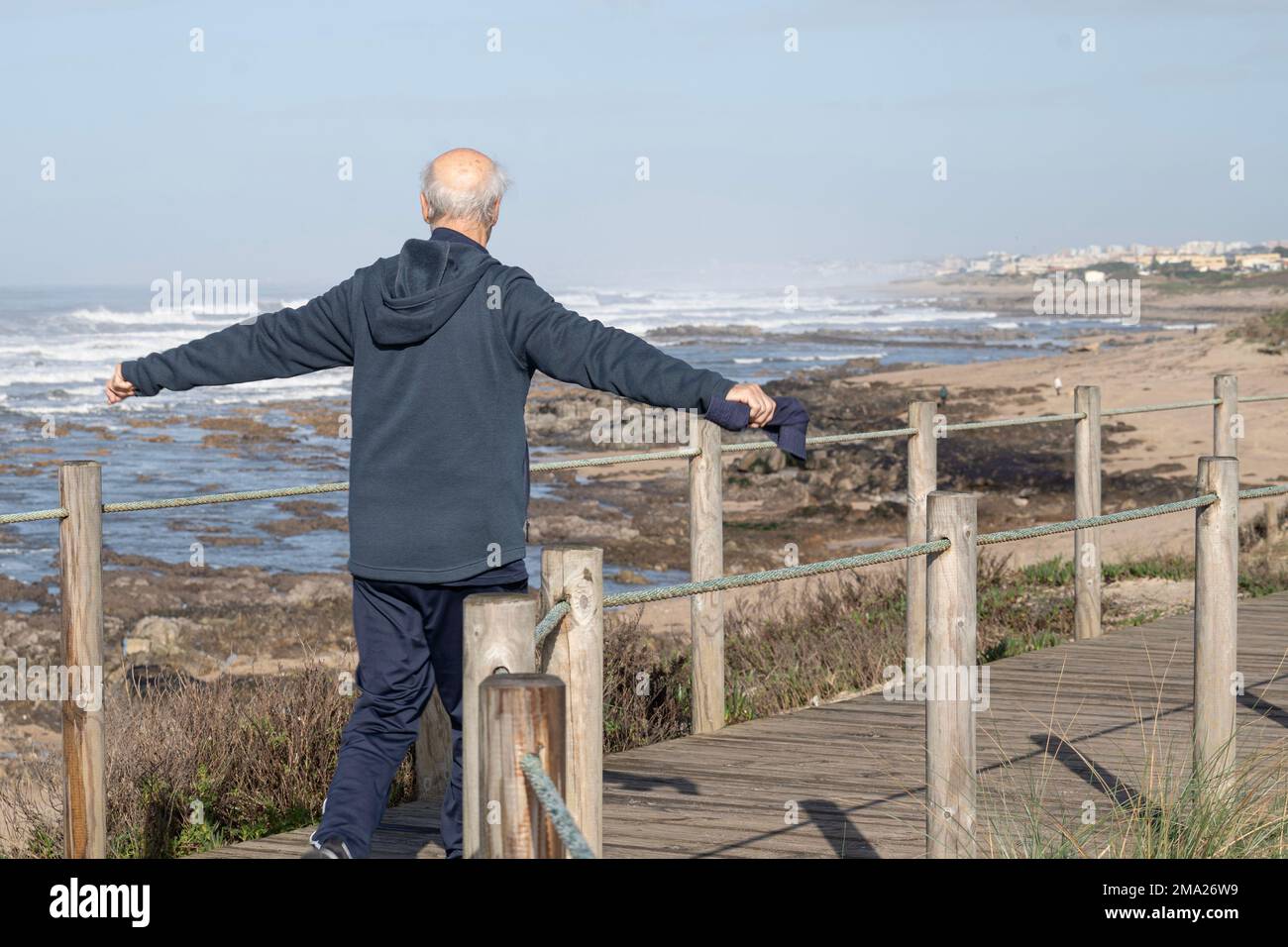 Person trying to balance hi-res stock photography and images - Alamy