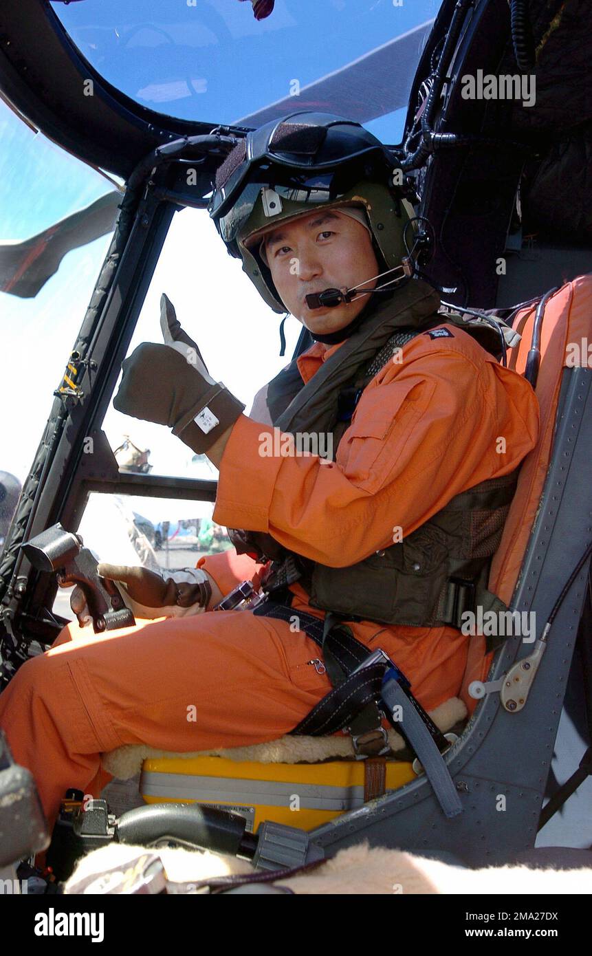 040712-N-0684R-088. [Complete] Scene Caption: A South Korean pilot ...