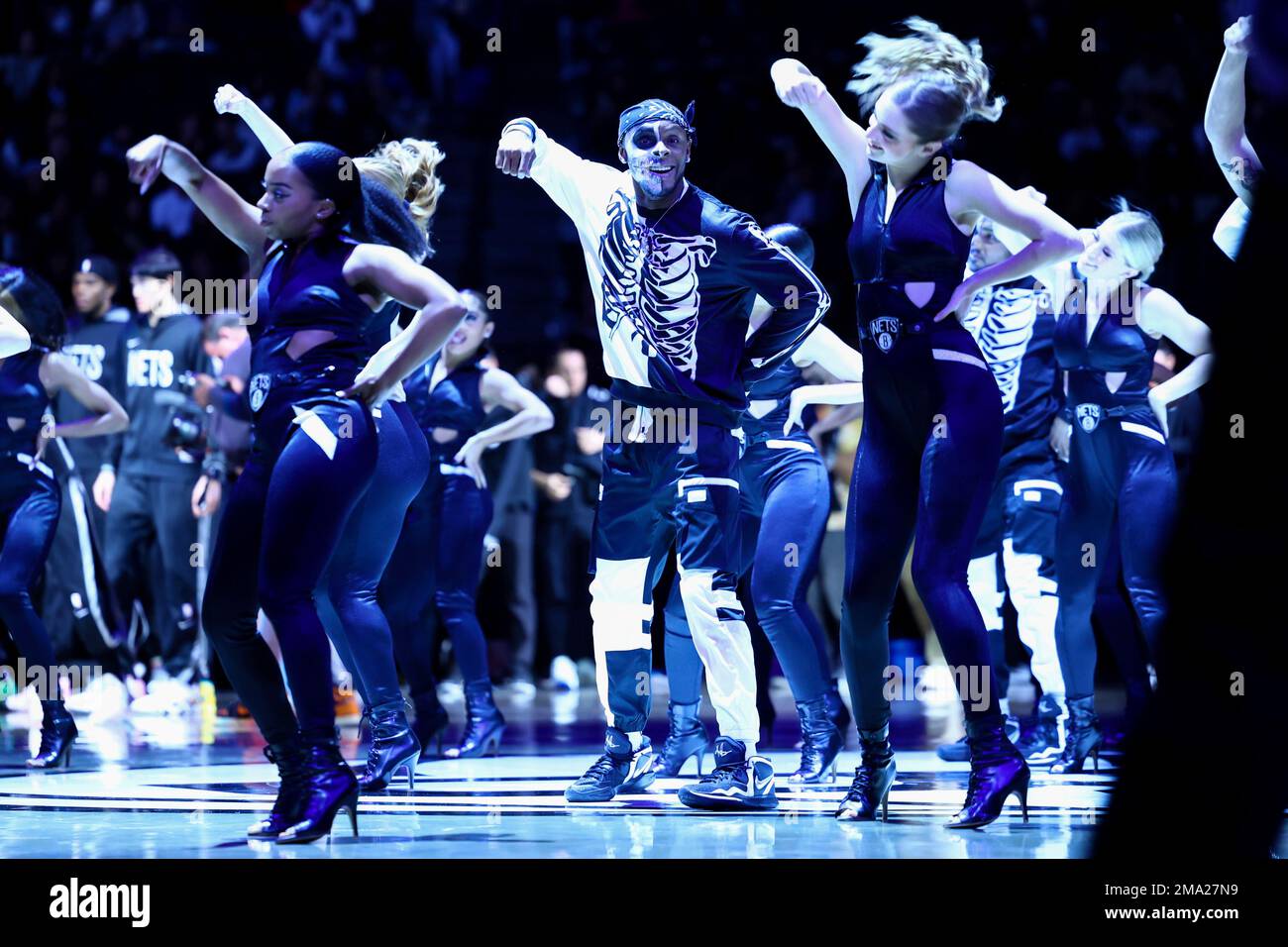 The Brooklynettes dance team performs before an NBA basketball game ...