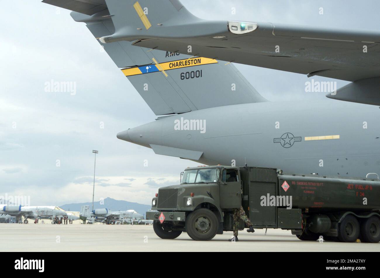 040813-F-3208M-320. A Fuel truck positioned next to the awaiting US Air ...