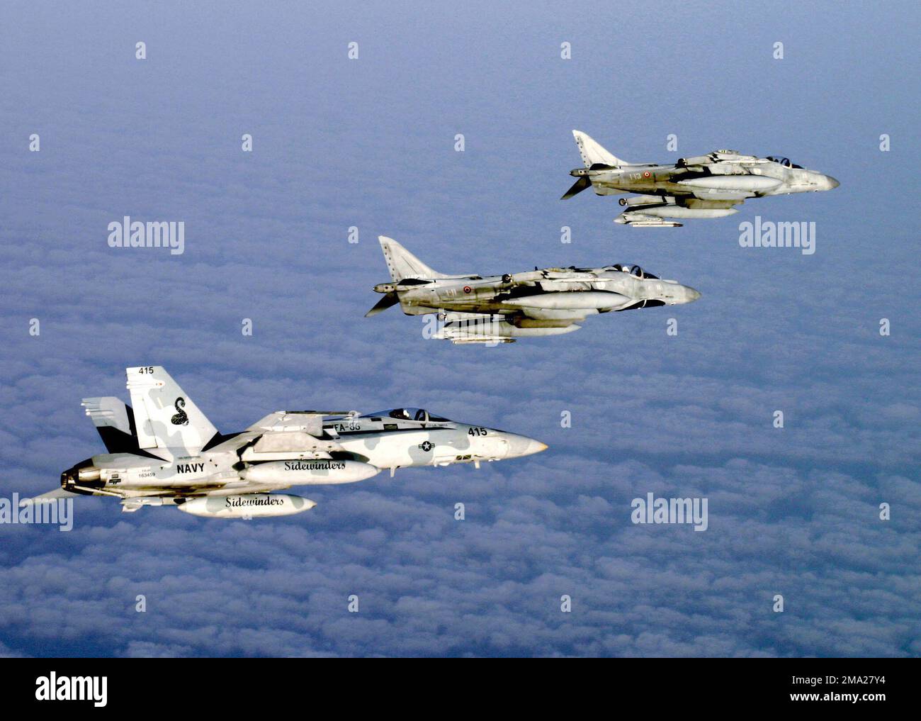 040712-N-3799S-008. [Complete] Scene Caption: Above the clouds over the ...