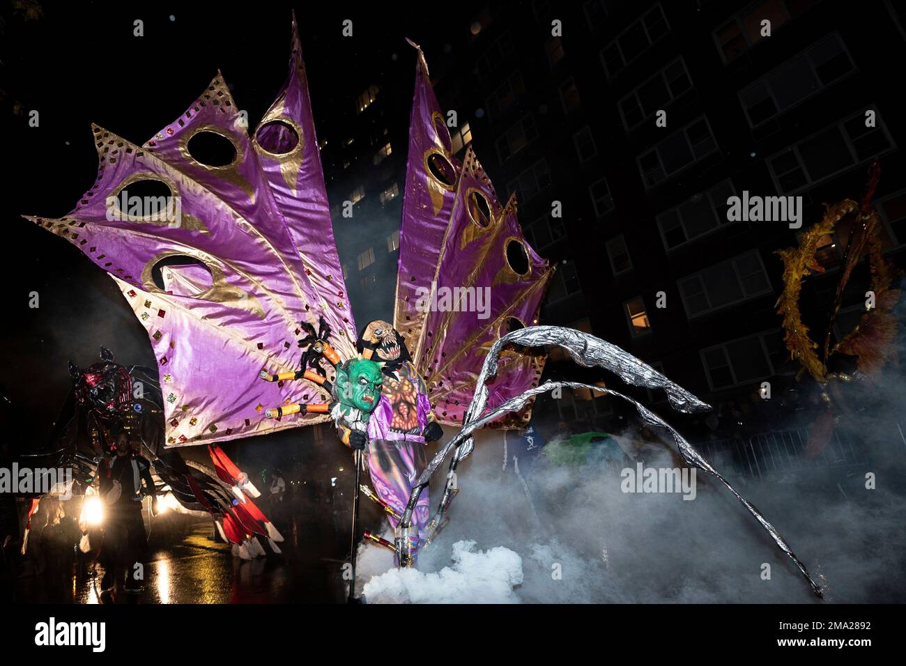 A reveler marches in the Greenwich Village Halloween Parade, late ...