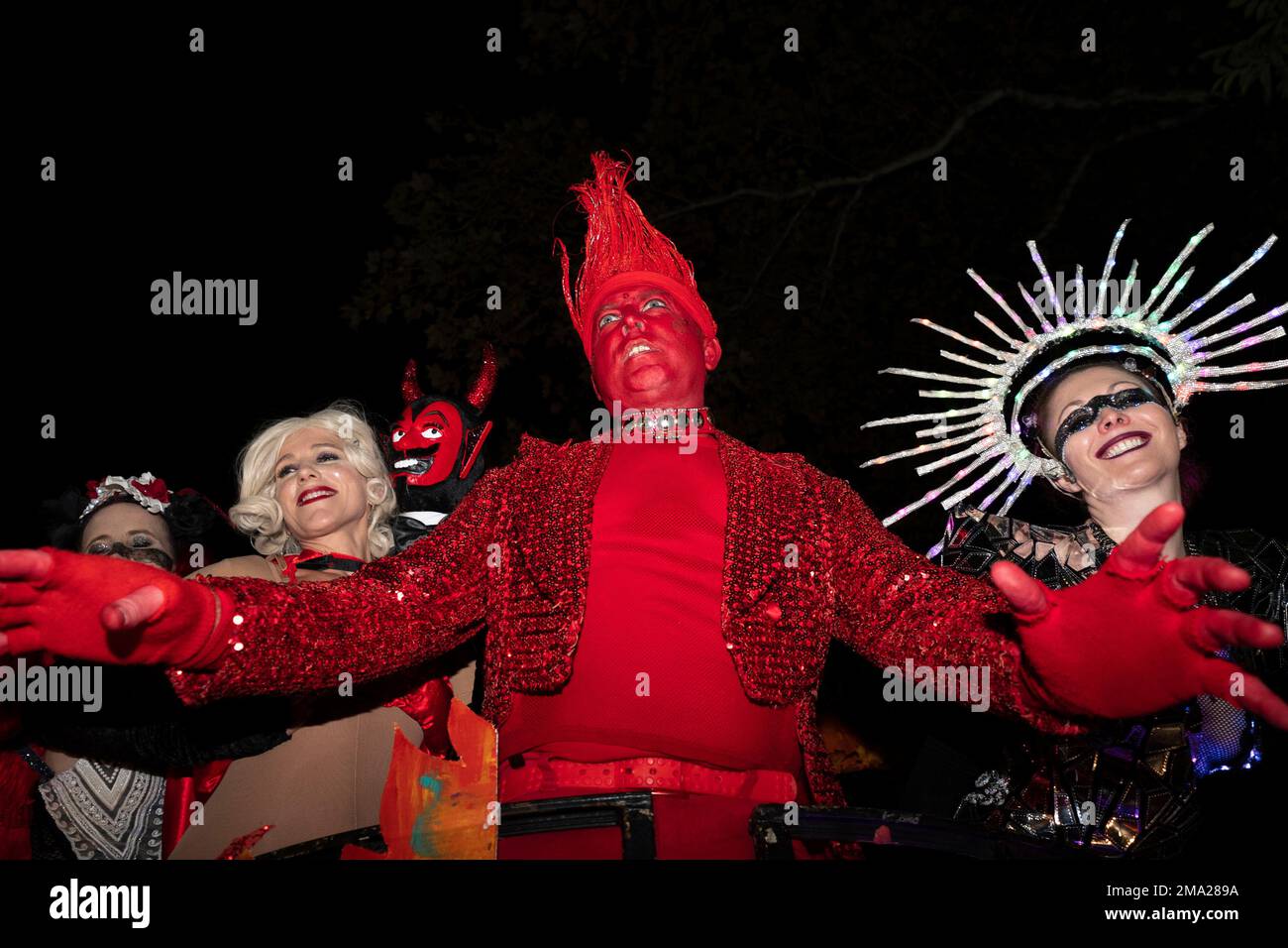 Revelers pose for photos during the Greenwich Village Halloween Parade ...