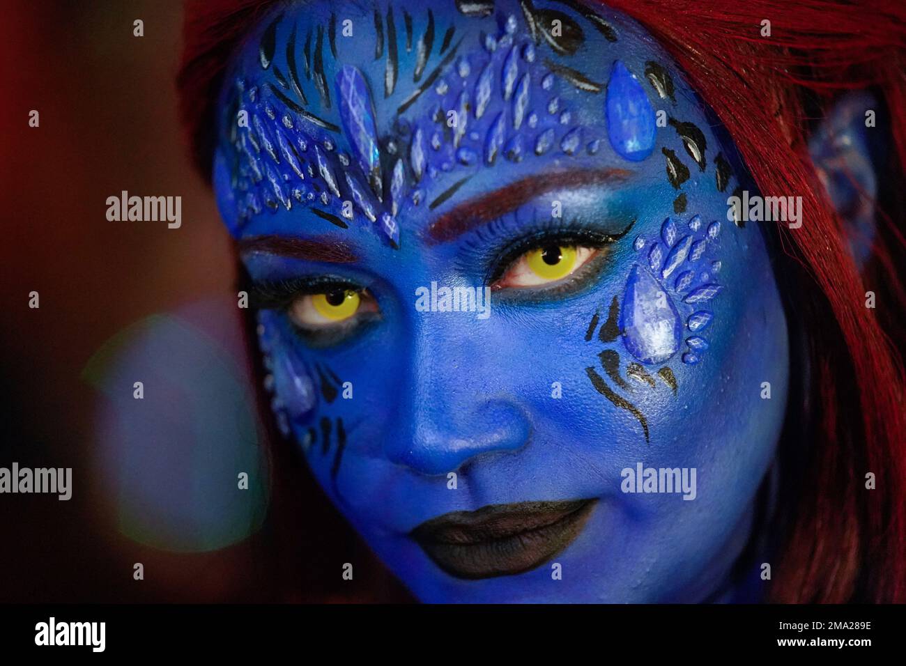 A reveler marches in the Greenwich Village Halloween Parade, late ...