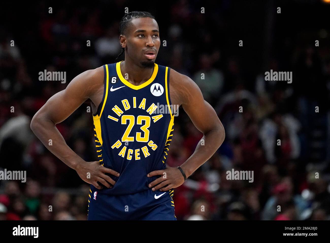 Indiana Pacers' Aaron Nesmith waits for play to resume during an NBA ...