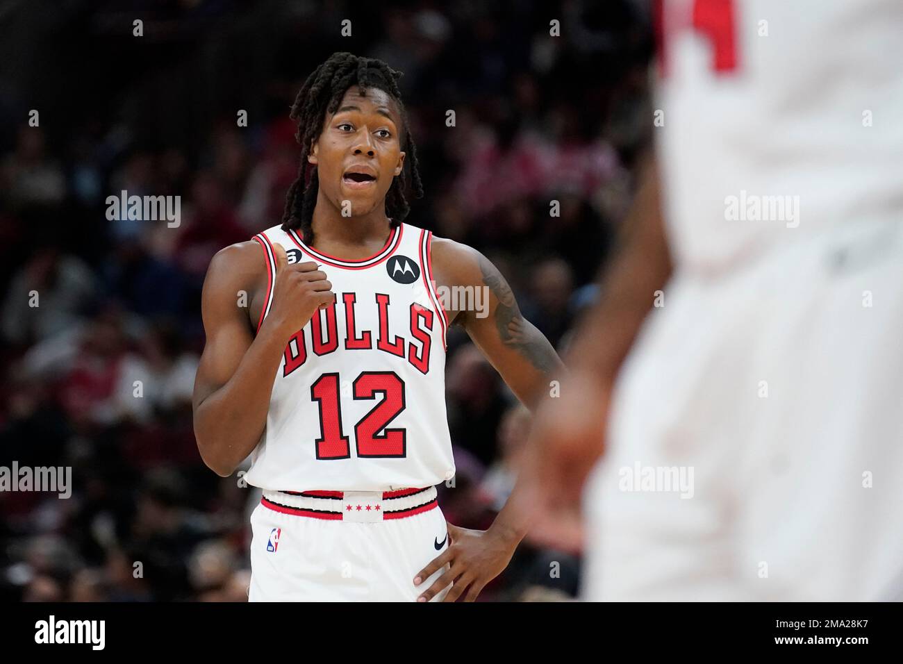 Chicago Bulls' Ayo Dosunmu directs a teammate during an NBA basketball ...
