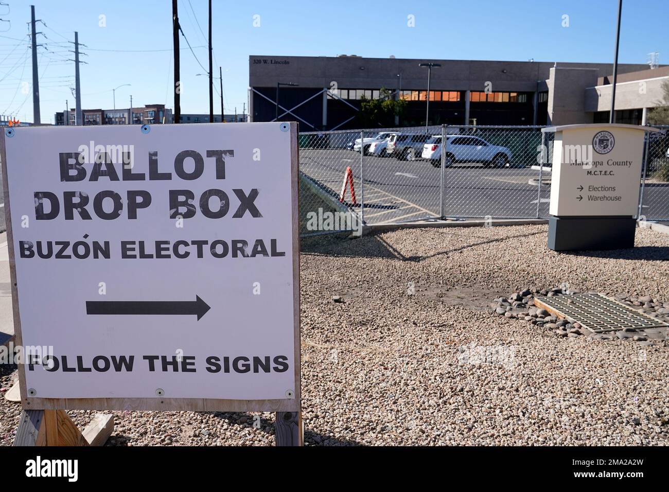 Signs direct voters to drop off their ballots at a secure ballot drop ...