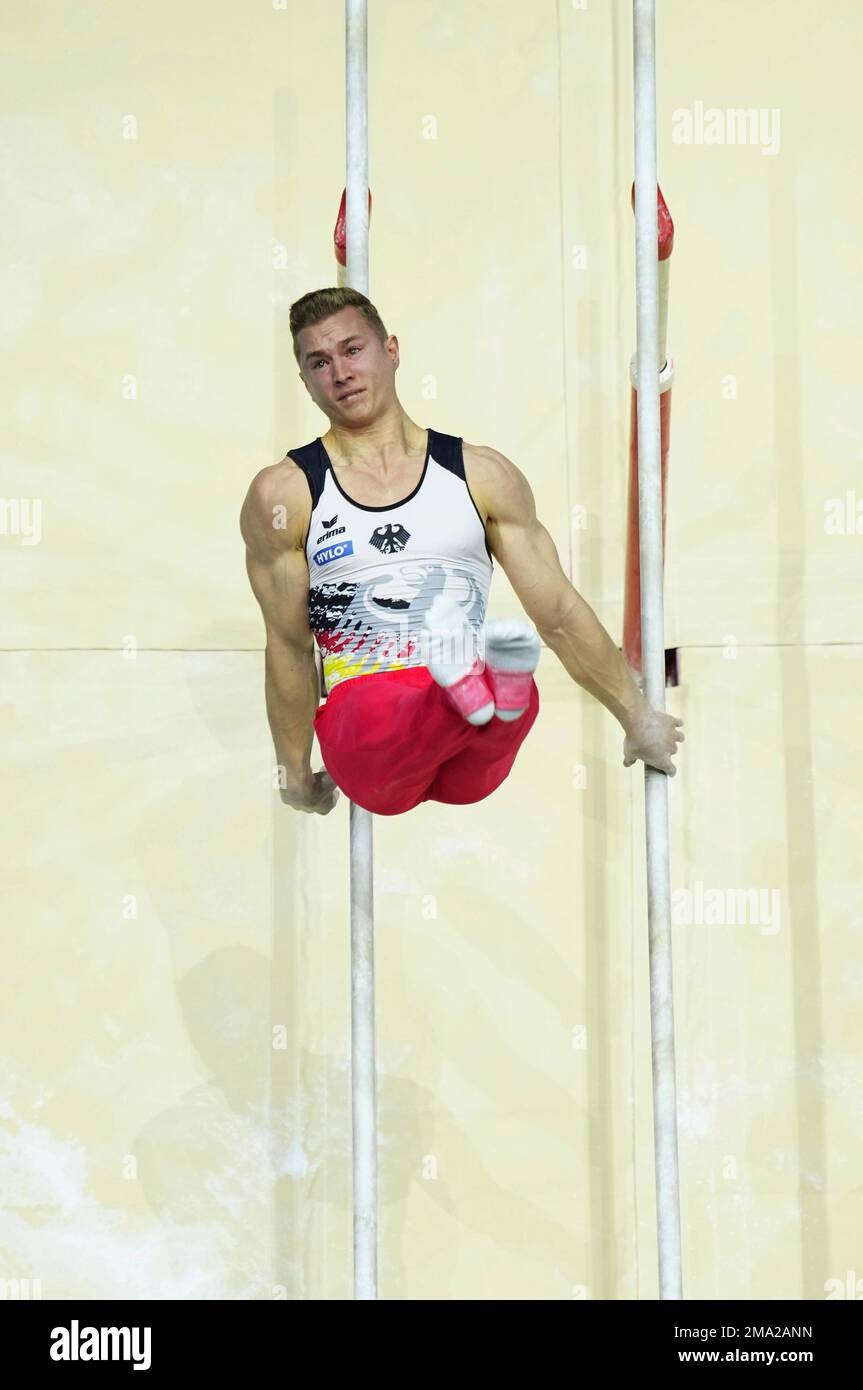 Glenn Trebing of Germany competes on the parallel barsduring the ...