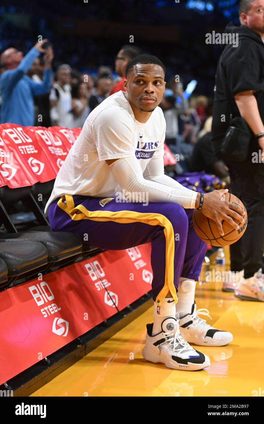 Los Angeles Lakers guard Russell Westbrook sits on the bench before an ...