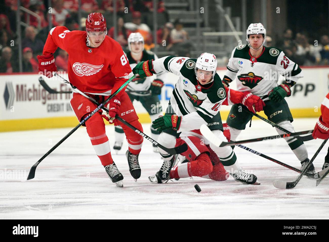 Minnesota Wild left wing Matt Boldy (12) skates for the puck in front ...