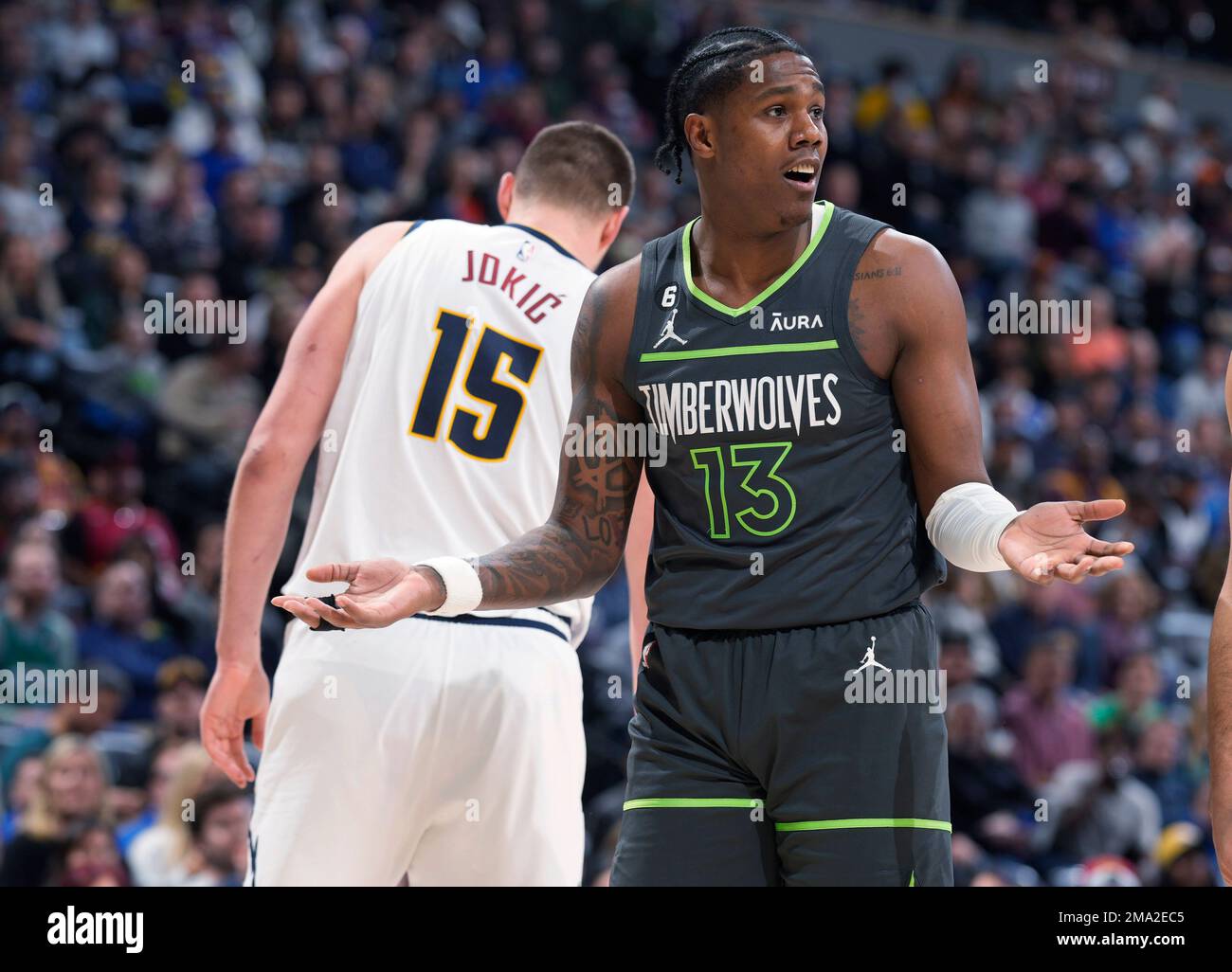 Minnesota Timberwolves forward Nathan Knight, front, argues after he ...