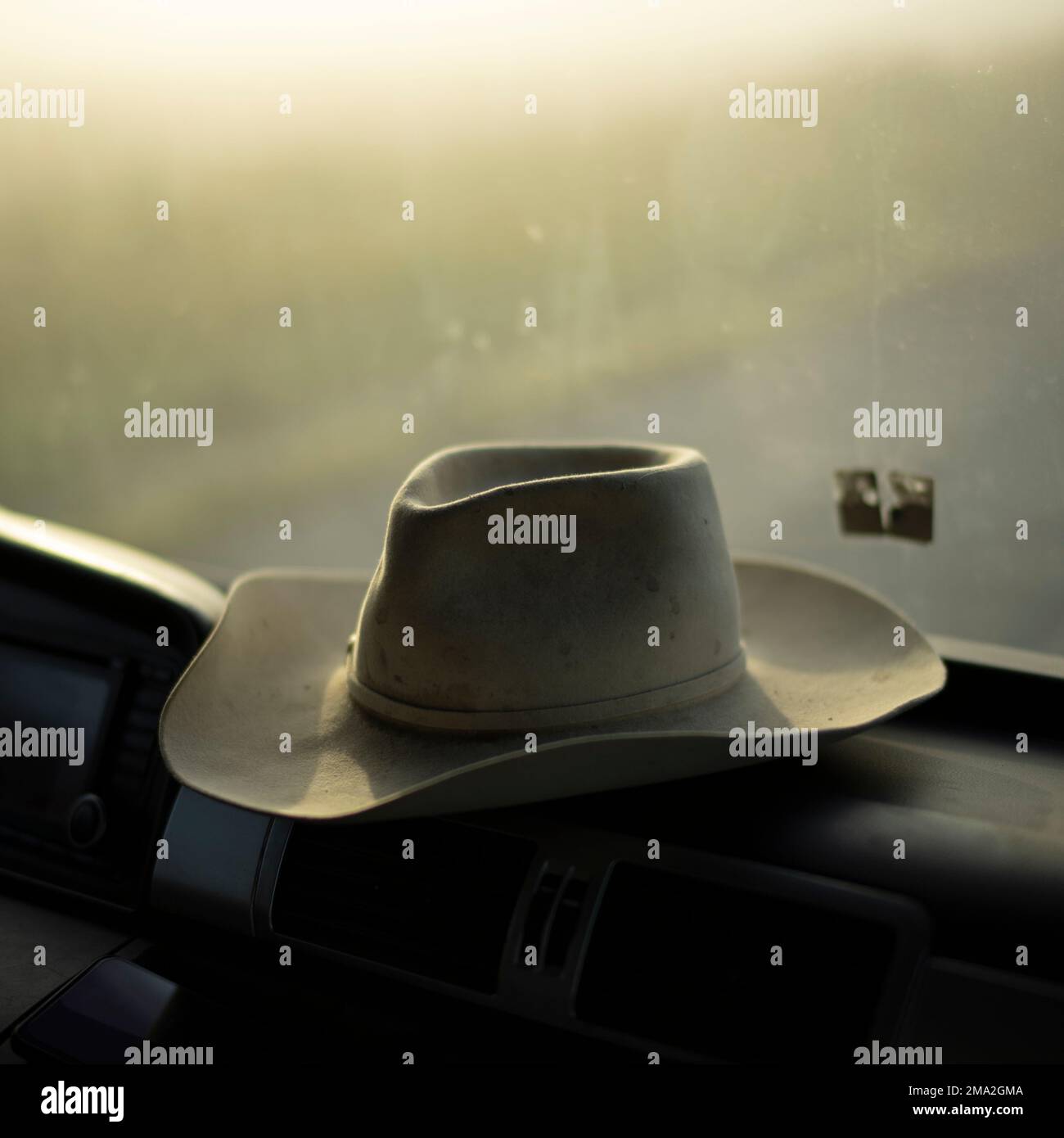 Manadier Jean-Claude Groul's hat sits on the dashboard of his truck as ...