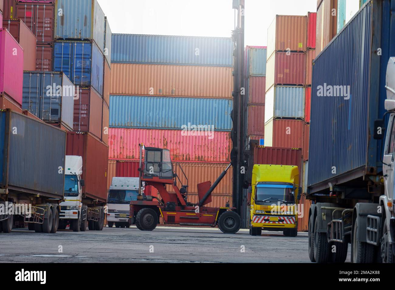 Container forklifts and container delivery trucks for packaging and ...