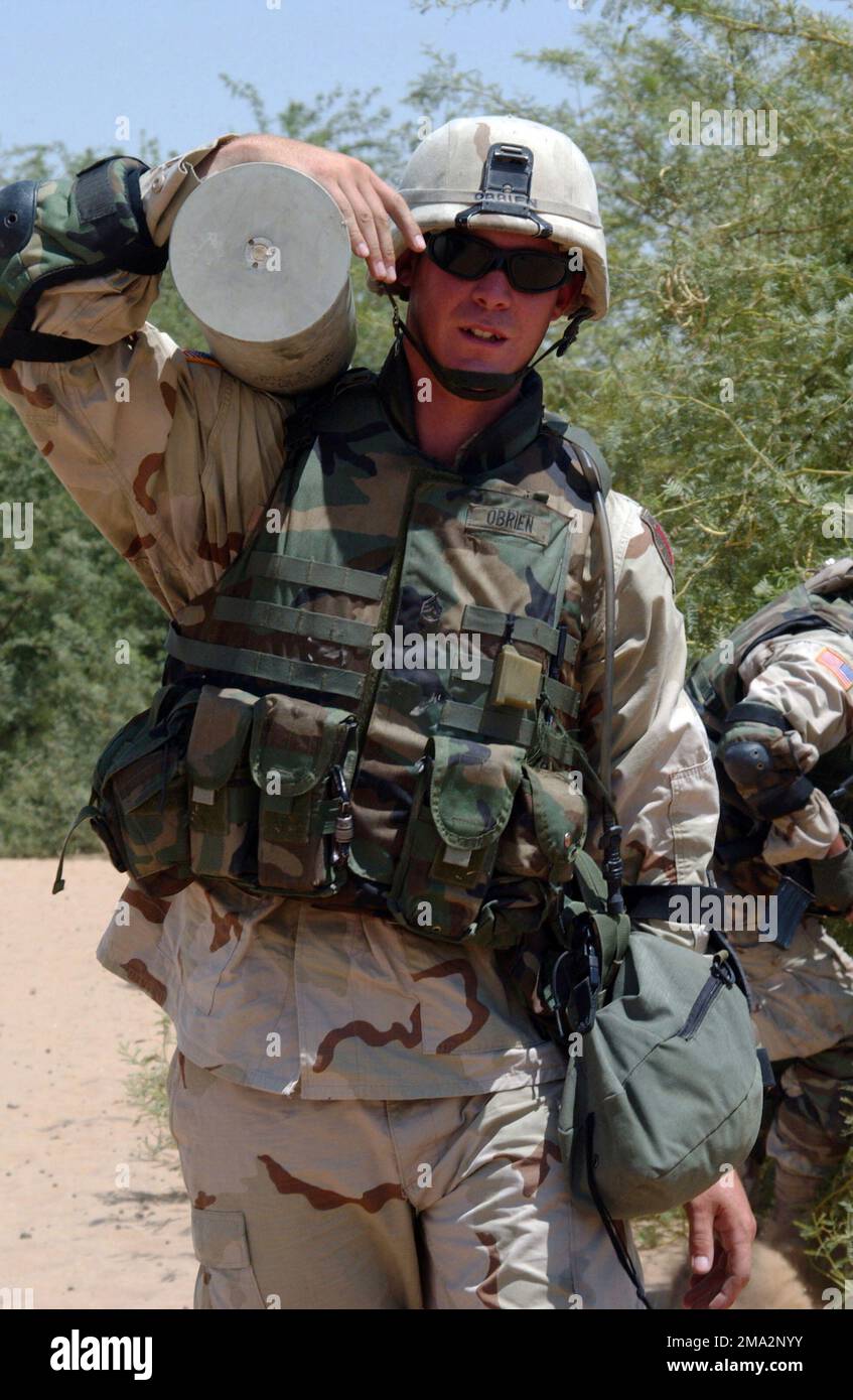 Carrying an old artillery shell to a hmmwv hi-res stock photography and ...