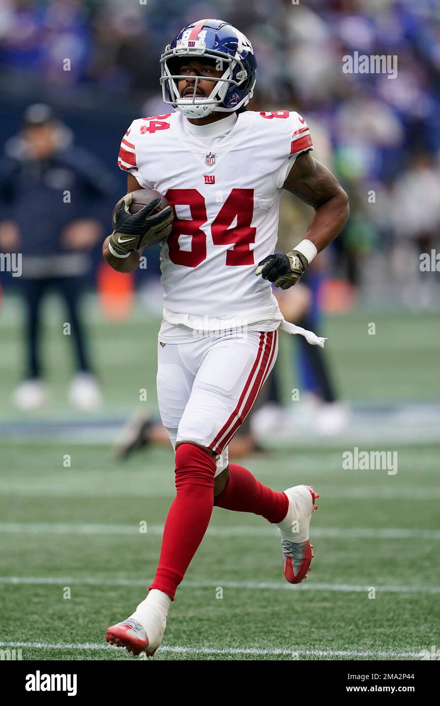 New York Giants wide receiver Marcus Johnson (84) warms up before an ...