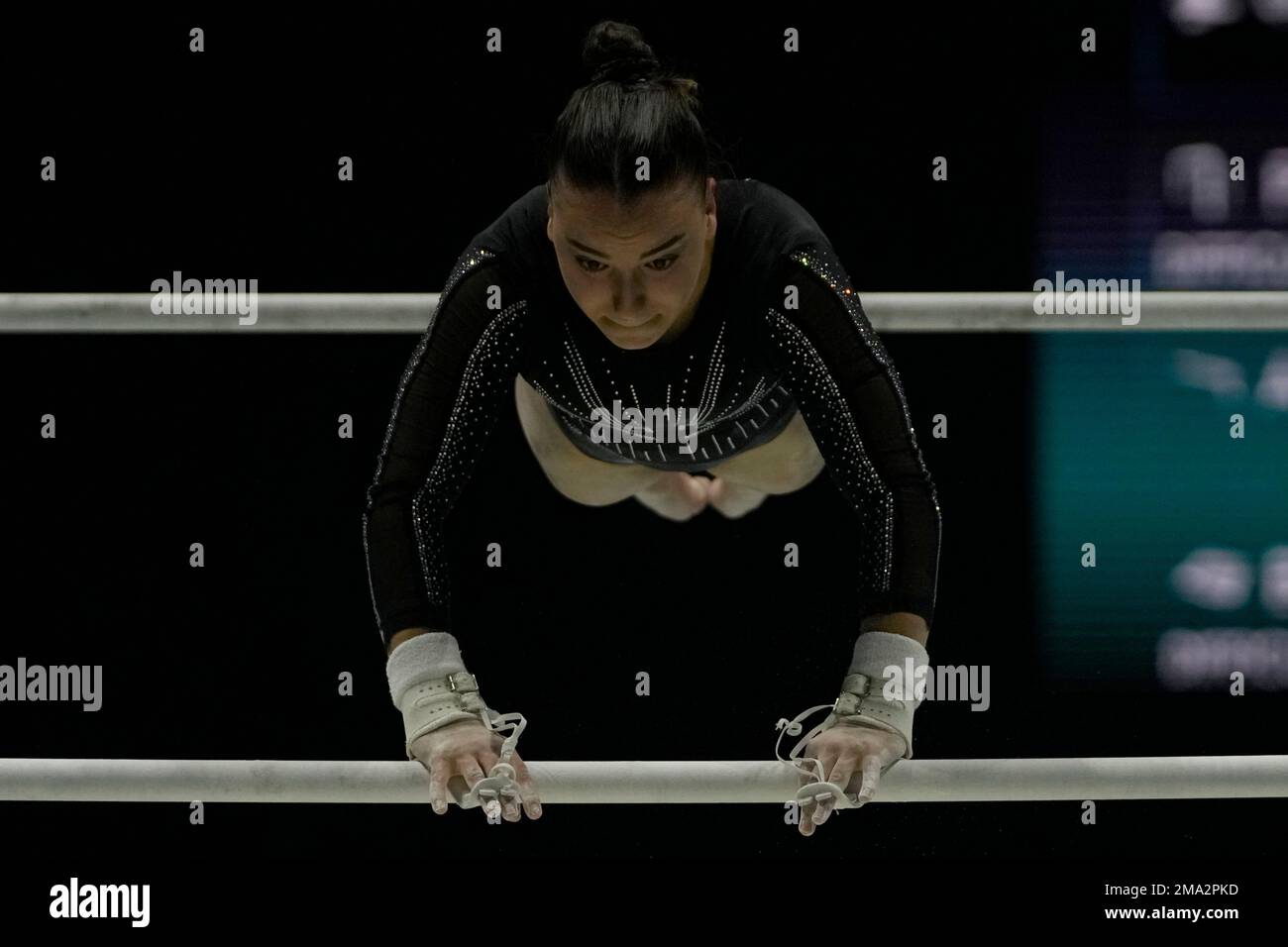 Anna Wildi of Switzerland competes in the women's uneven bars during ...