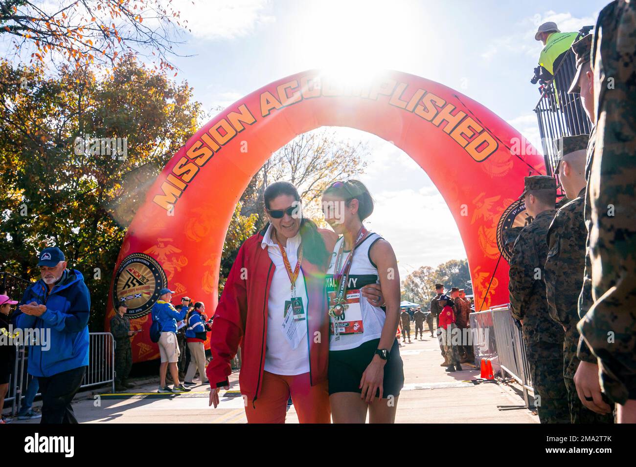 Chelsea Baker, right, finishes as the first woman to complete to the ...