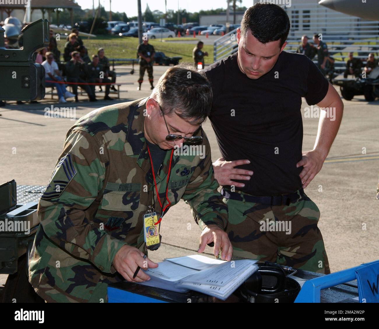 US Air Force (USAF) CHIEF MASTER Sergeant (CMSGT) Pete Romeo (left), a ...