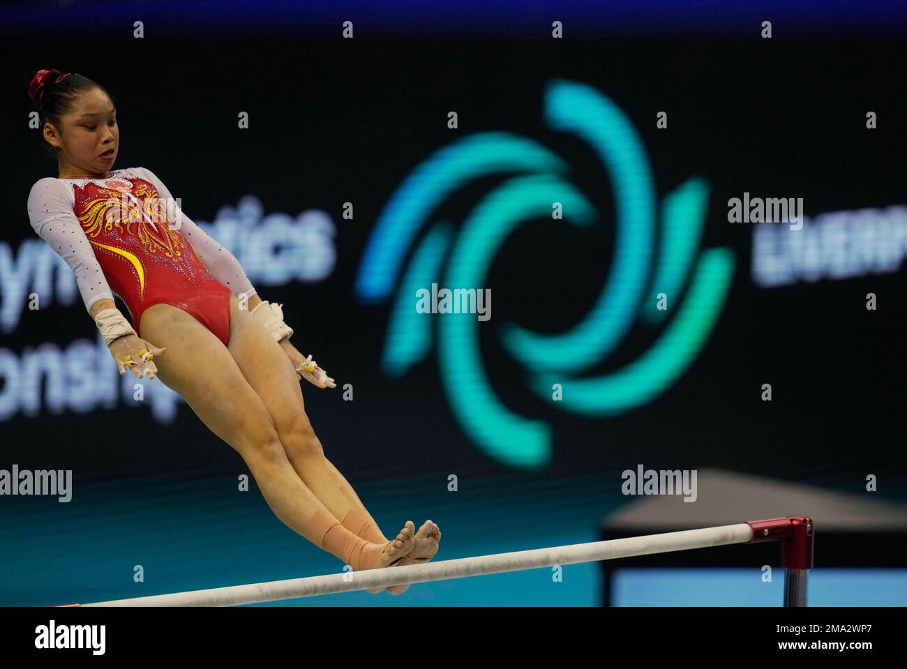 China's Luo Rui competes on the uneven bars during the Artistic ...