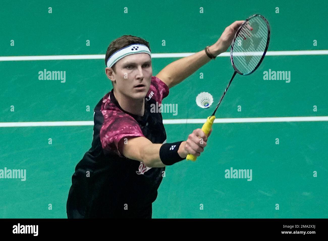 Viktor Axelsen of Denmark competes against Rasmus Gemke of Denmark ...
