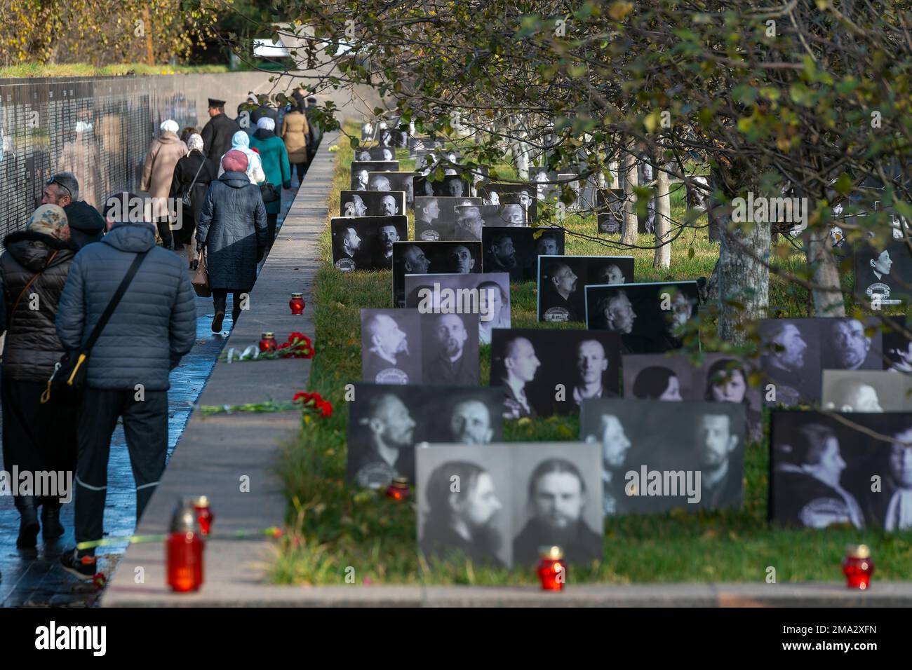 People visit the Garden of Memory memorial, the mass grave memorial ...
