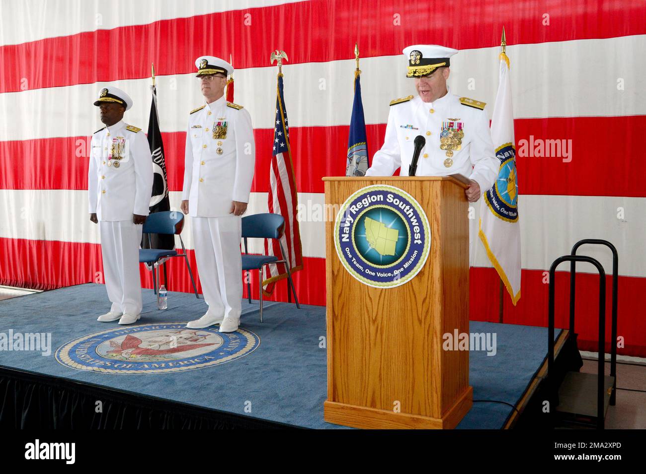 SAN DIEGO (May 23, 2022) Rear Adm. Bradley N. Rosen, right, reads his ...