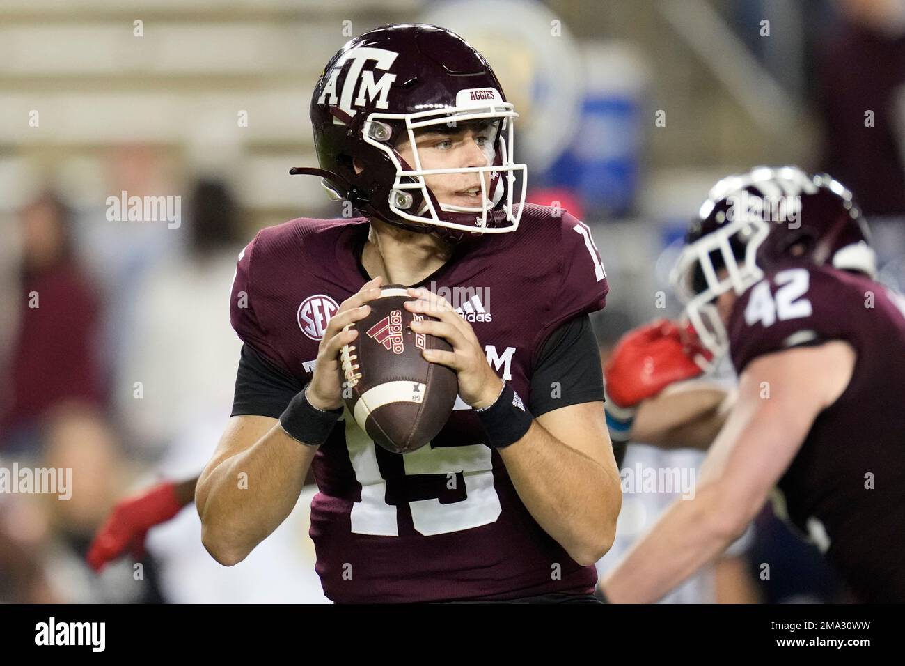 Texas A&M quarterback Conner Weigman (15) looks to pass down field ...