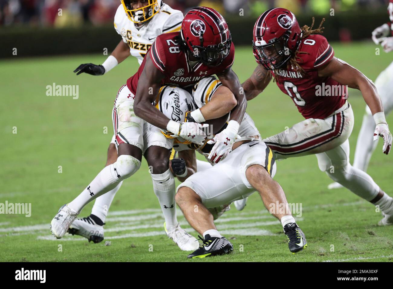 South Carolina defensive back Darius Rush (28) tackles Missouri running ...