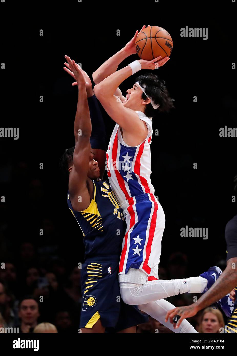 Brooklyn Nets forward Yuta Watanabe, right, shoots over Indiana Pacers ...