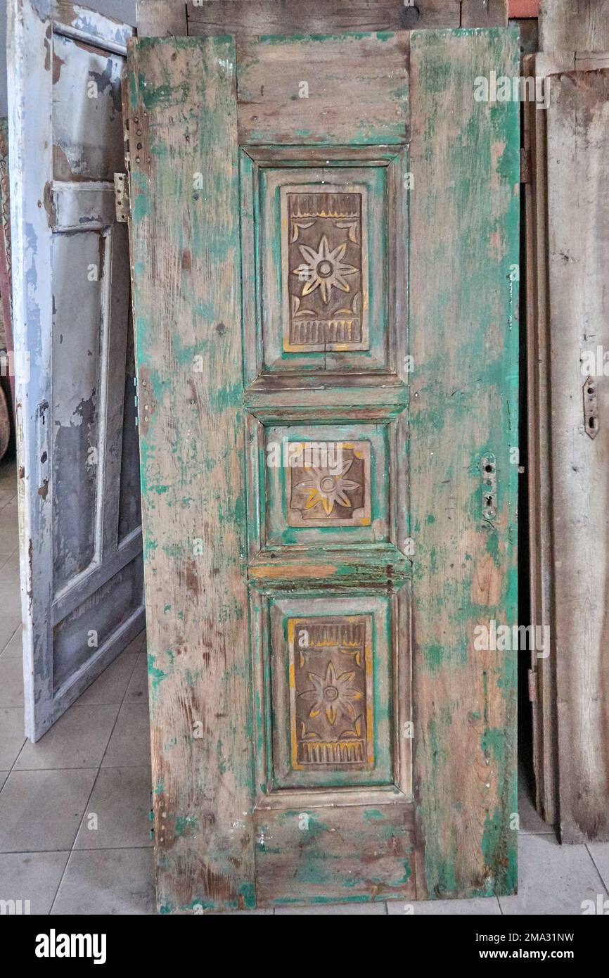 Traditional handmade wooden door in near plan Stock Photo - Alamy