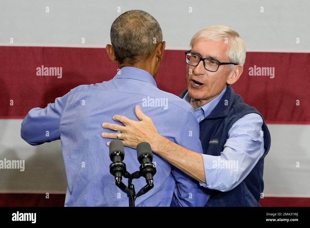 Former President Barack Obama hugs Wisconsin Democratic Gov. Tony Evers ...